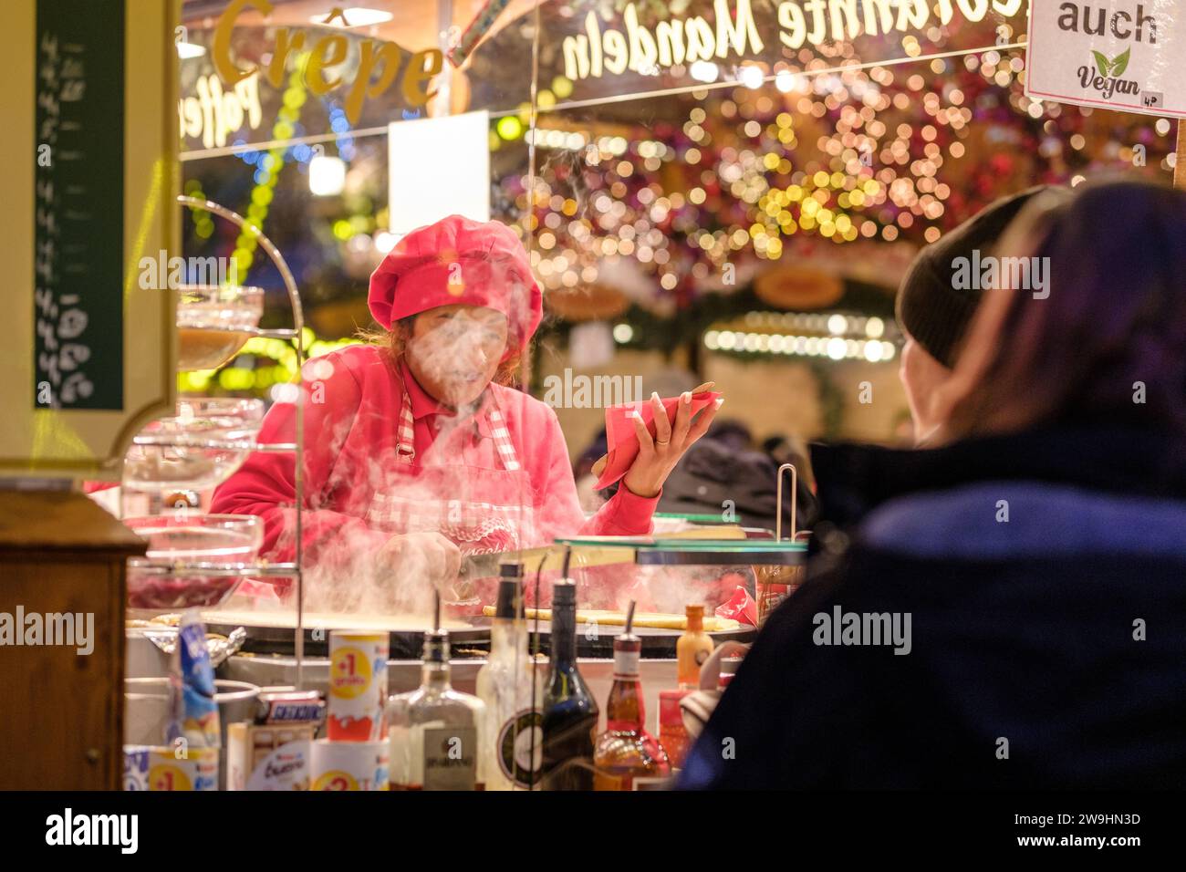 Bonn, Germany - December 16, 2023 : View of a food stand selling candy ...