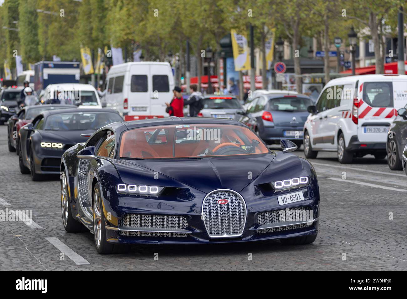 Paris, France - Lake Blue Bugatti Chiron driving on the Champs Elysée ...