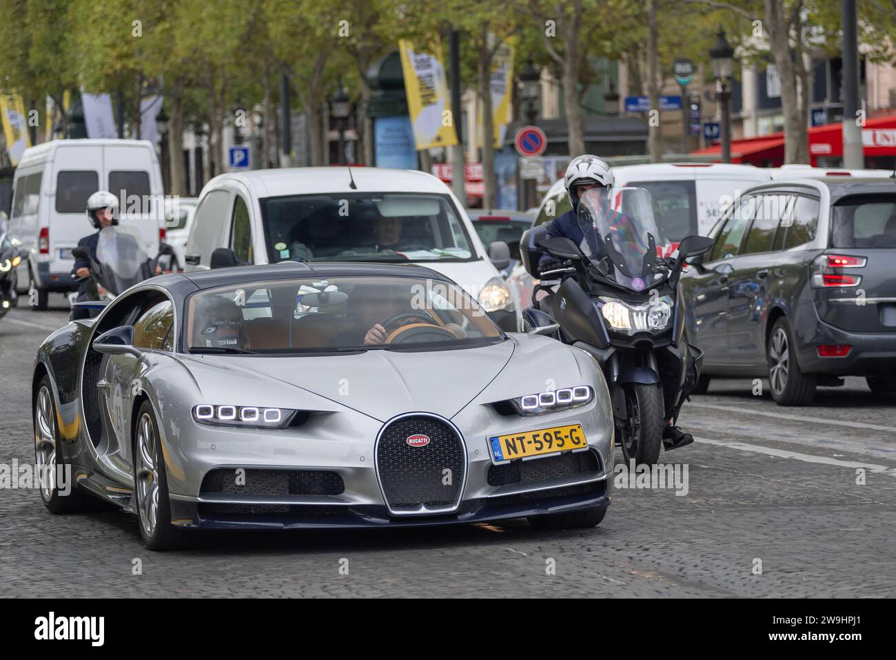 Paris, France - Turquoise Carbon and Silver Bugatti Chiron driving on ...