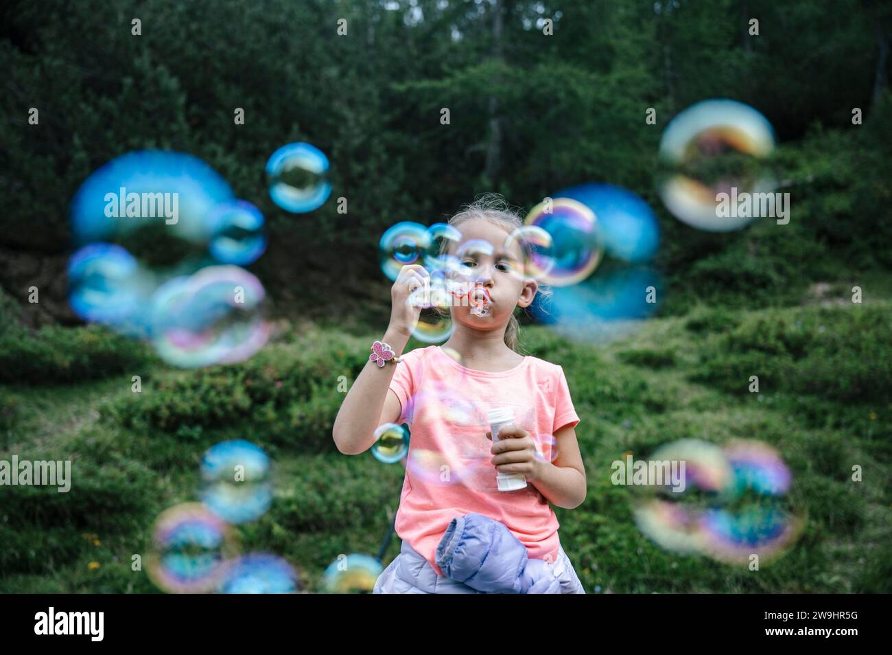 Toddler girl blowing soap hi-res stock photography and images - Alamy