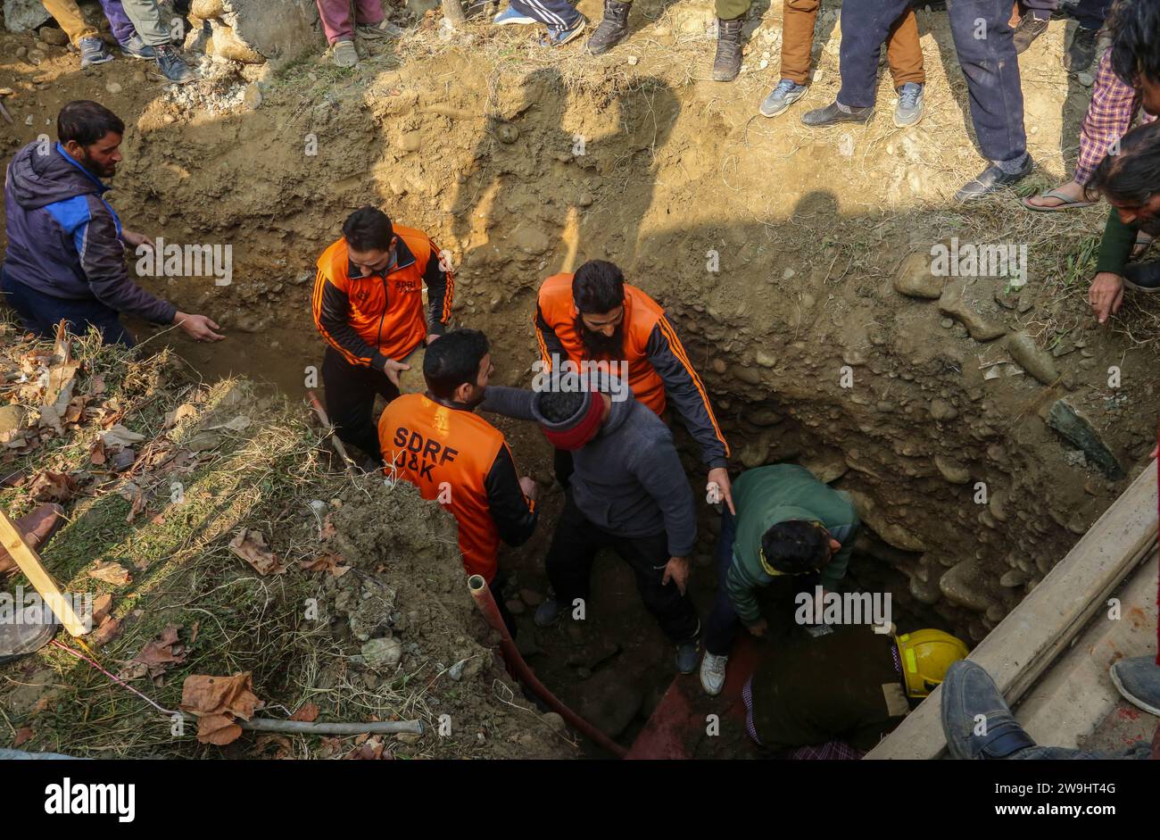 The State Disaster Response Force (SDRF) team works on the rescue of a ...