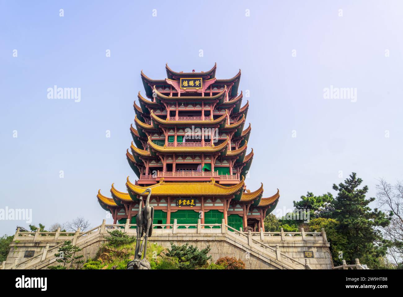 The front of the building inscribed with the plaque "Yellow Crane Tower ...