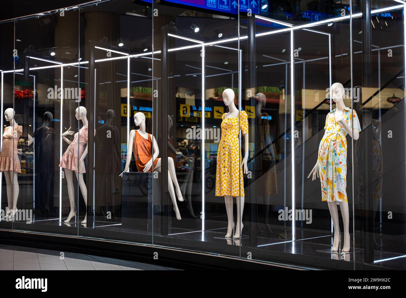 Colorful and artistic mannequins in a store display case Stock Photo ...