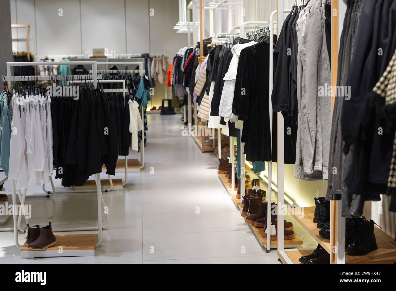 Clothing store inside shopping center, casual clothes Stock Photo - Alamy