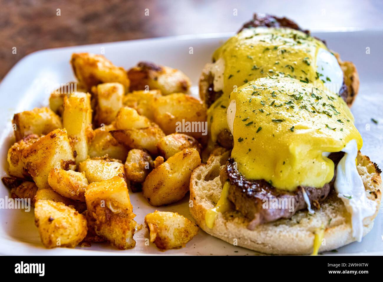 Eggs Benedict over a beef sirloin steak, high protein breakfast plate ...