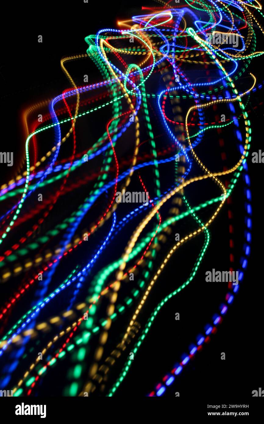 A photograph of vibrant multi-color lights in a long exposure photo ...