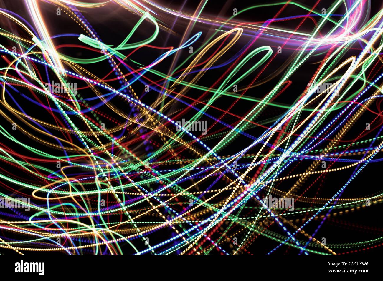 A photograph of vibrant multi-color lights in a long exposure photo ...