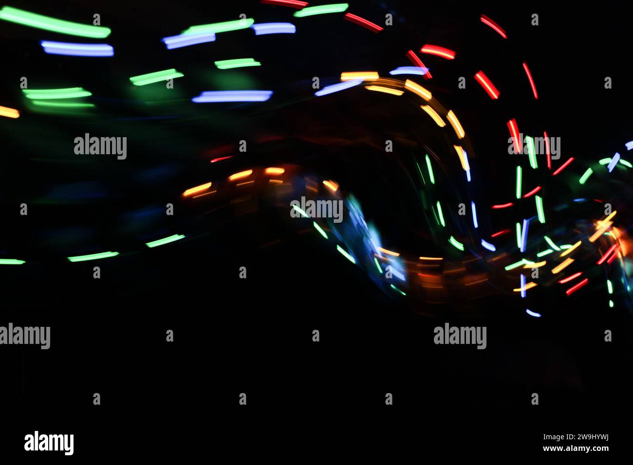 A photograph of vibrant multi-color lights in a long exposure photo ...