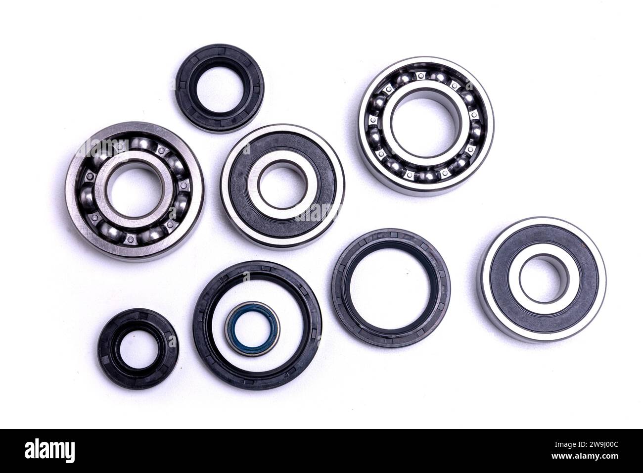 Ball bearings and rubber seals on a white background Stock Photo - Alamy