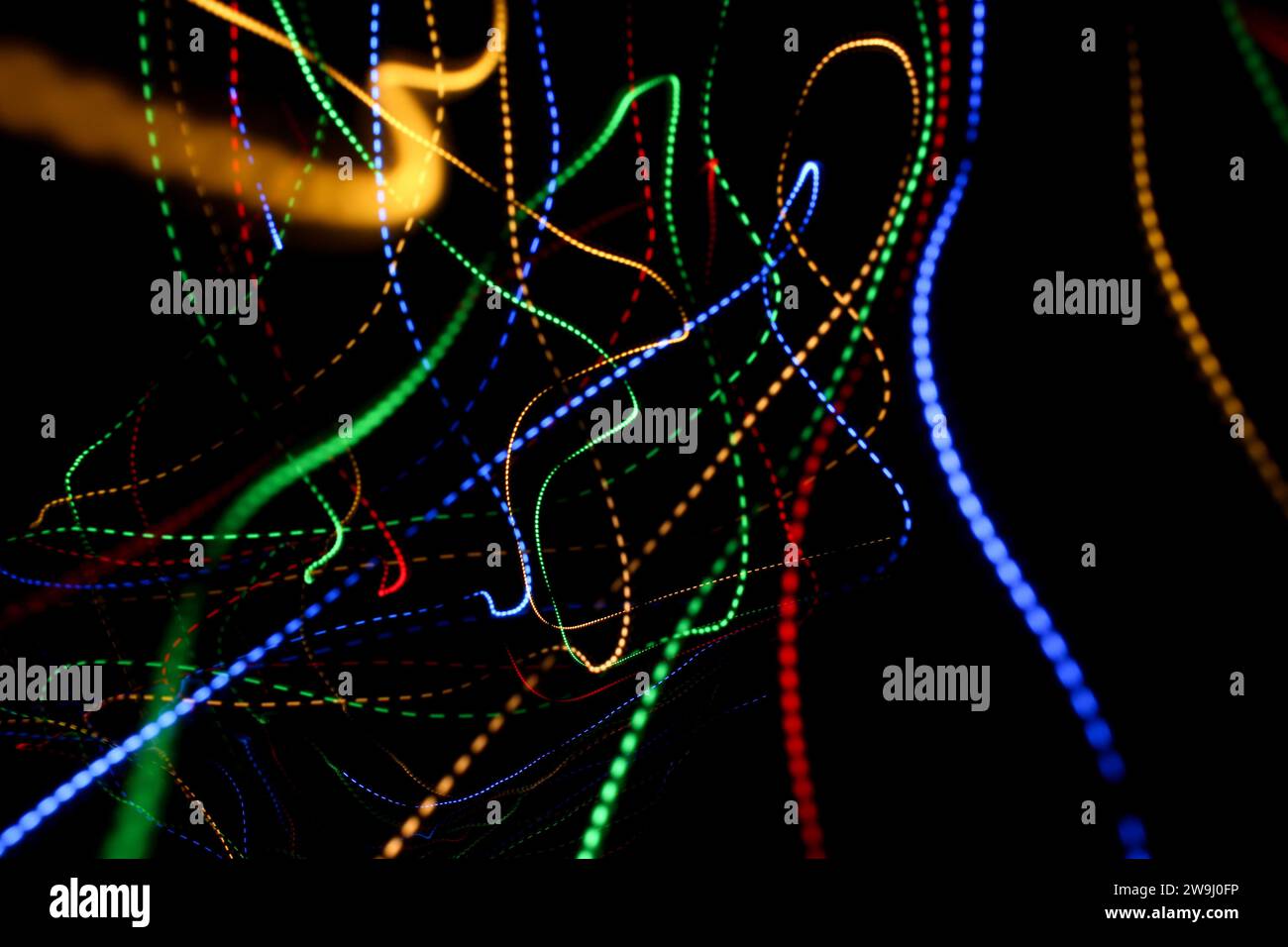 A photograph of vibrant multi-color lights in a long exposure photo ...
