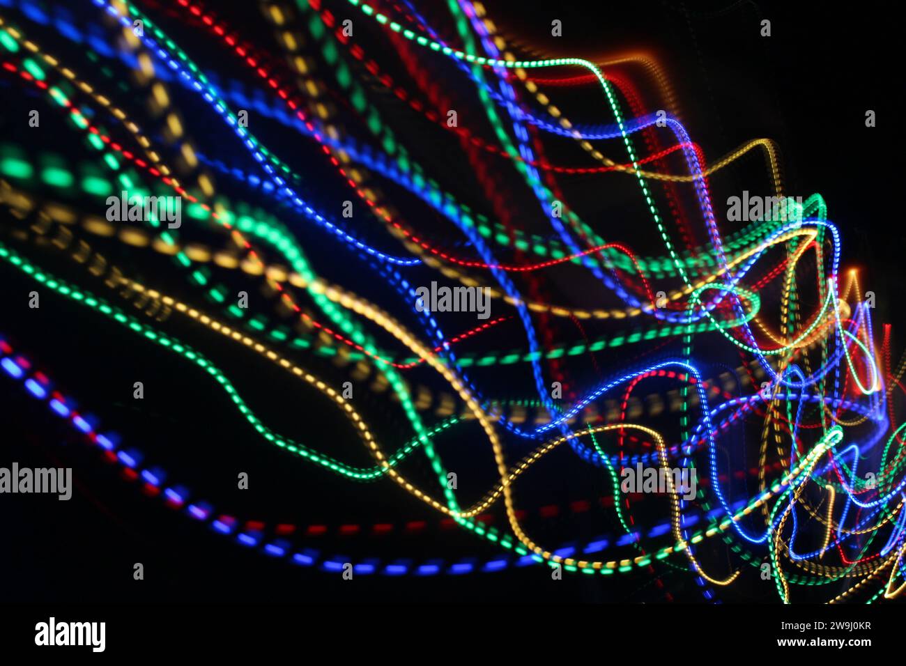A photograph of vibrant multi-color lights in a long exposure photo ...