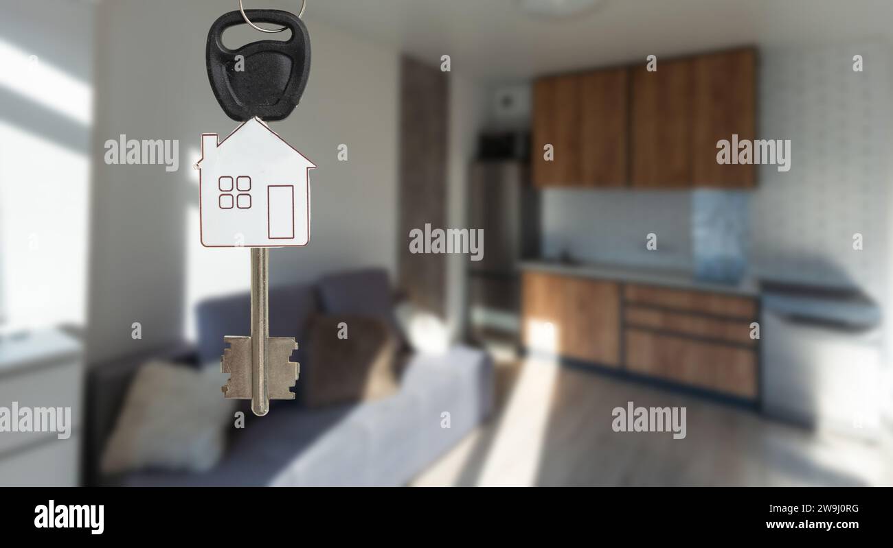 Open door with keys, key in keyhole Stock Photo - Alamy