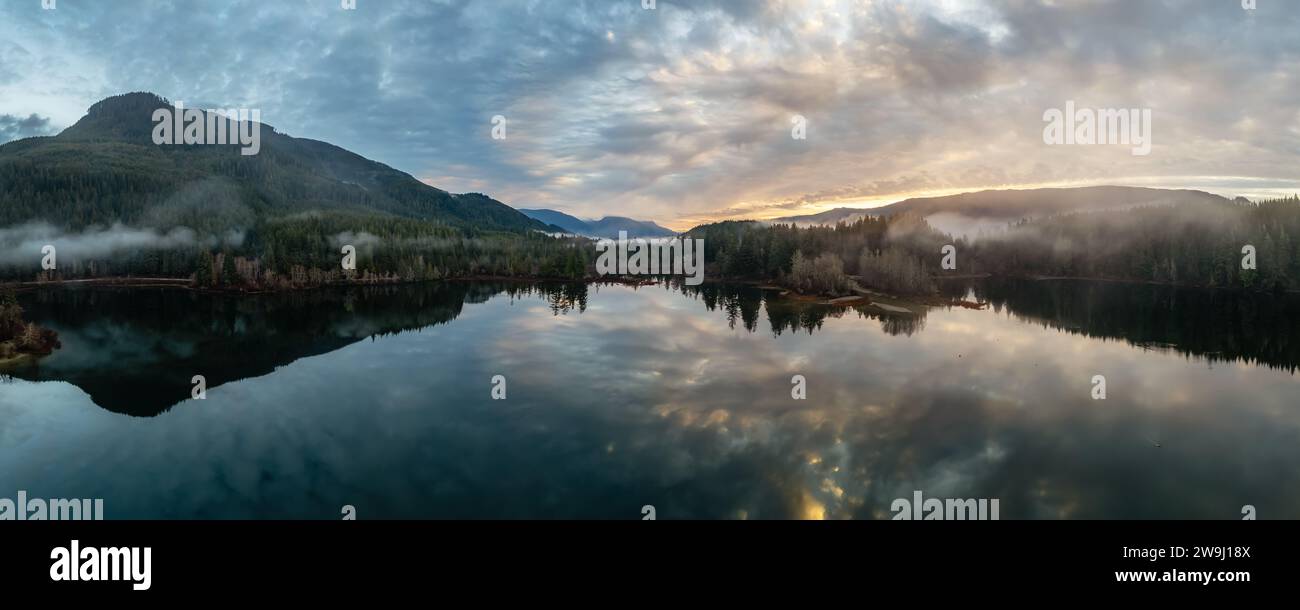 Valley by Lake, Mountains and Green Trees covered in fog. Canadian ...