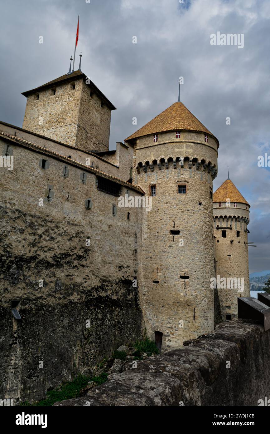 Ancient turrets of the Chillon Castle contreast against the stormy ...