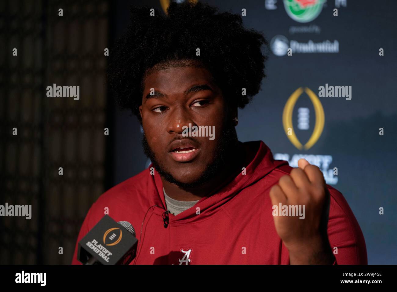 Alabama offensive lineman Tyler Booker speaks to reporters during a ...