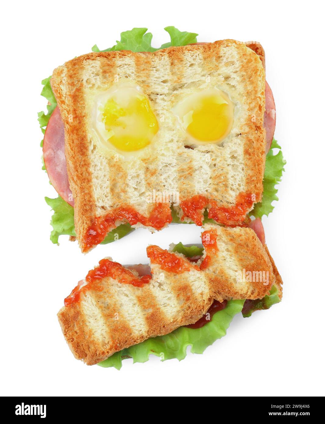 Cute monster sandwich with fried eggs isolated on white, top view ...