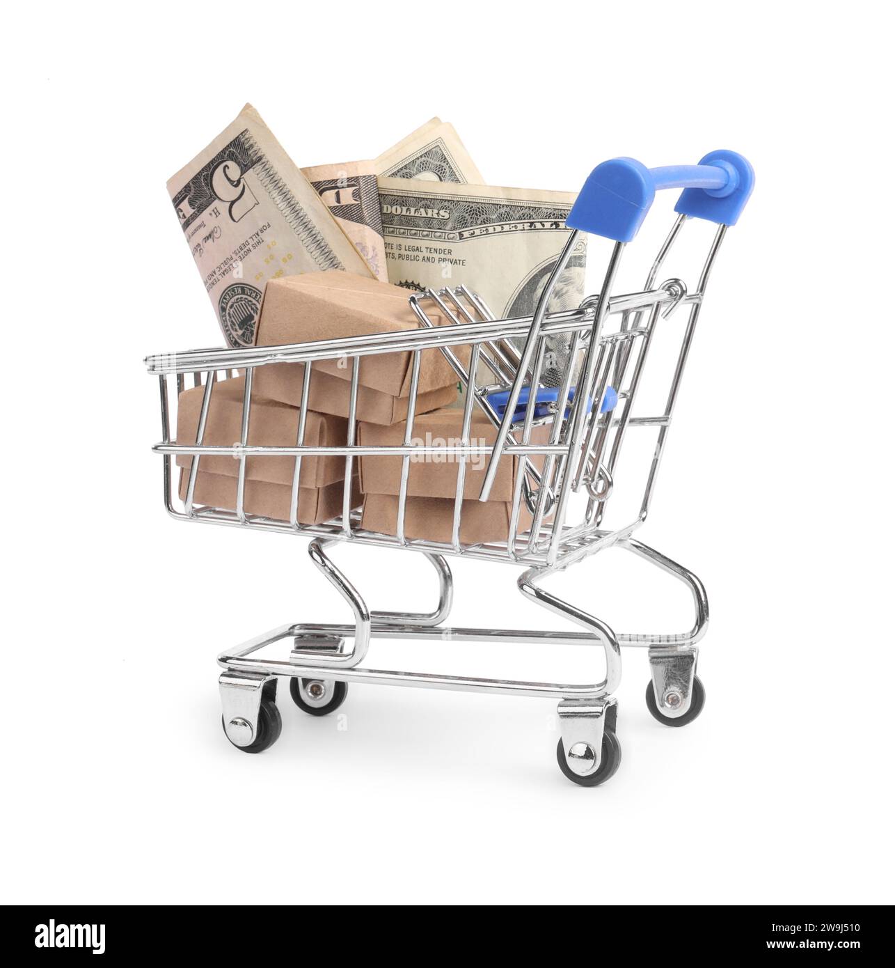 Small metal shopping cart with boxes and dollar bills isolated on white ...