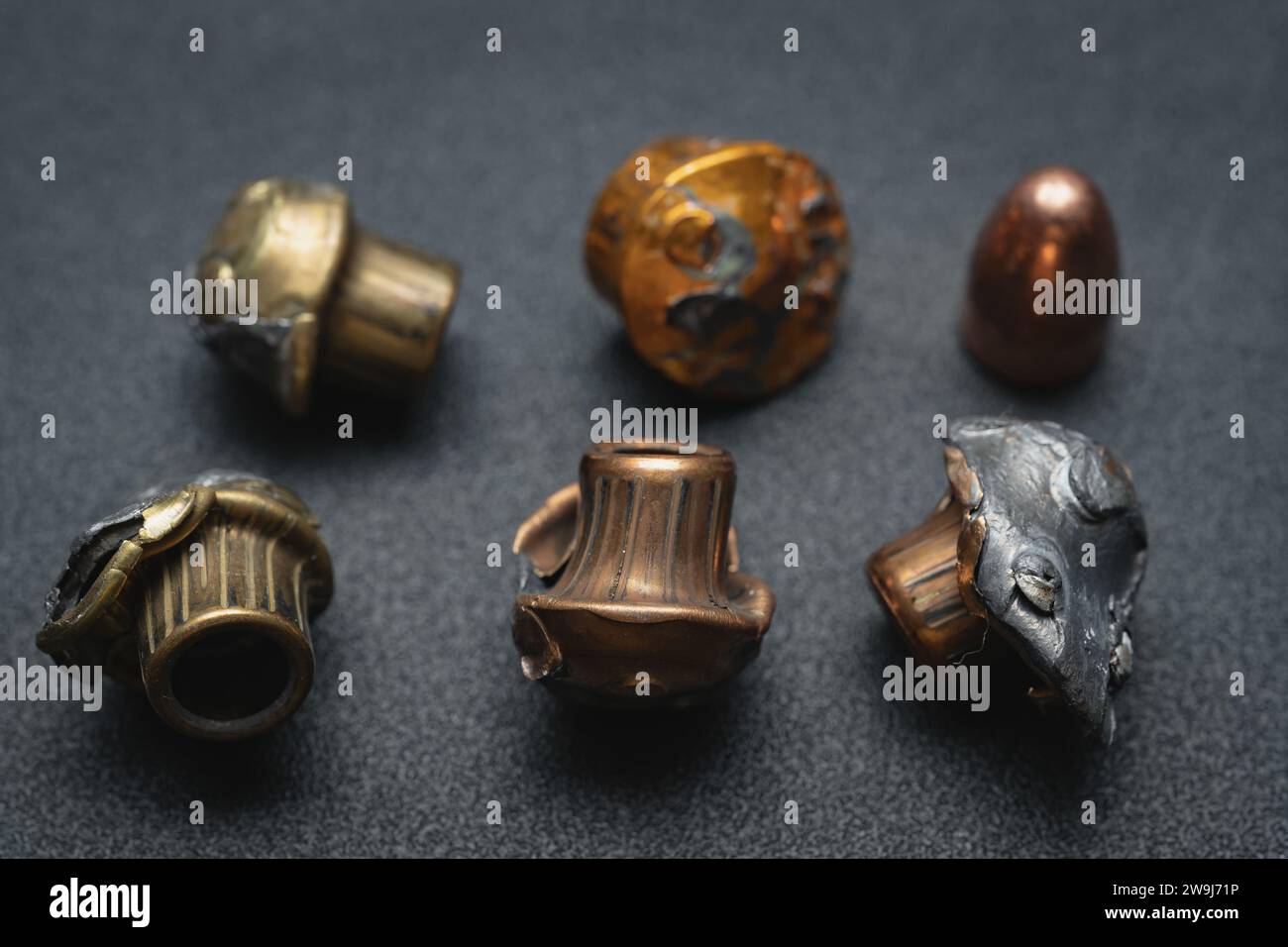 Crumpled bullets from a 9mm pistol, close-up photo. High quality photo ...