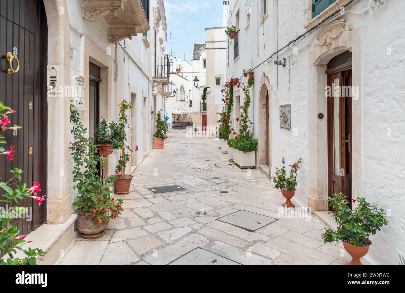 Characteristic narrow streets in the Locorotondo, metropolitan city of ...