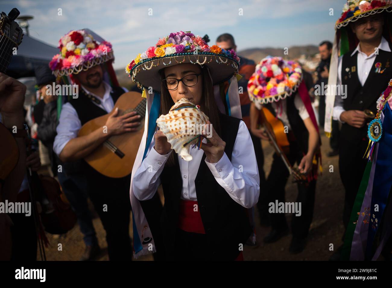 Malaga, Spain. 28th Dec, 2023. A girl dressed in traditional costumes ...
