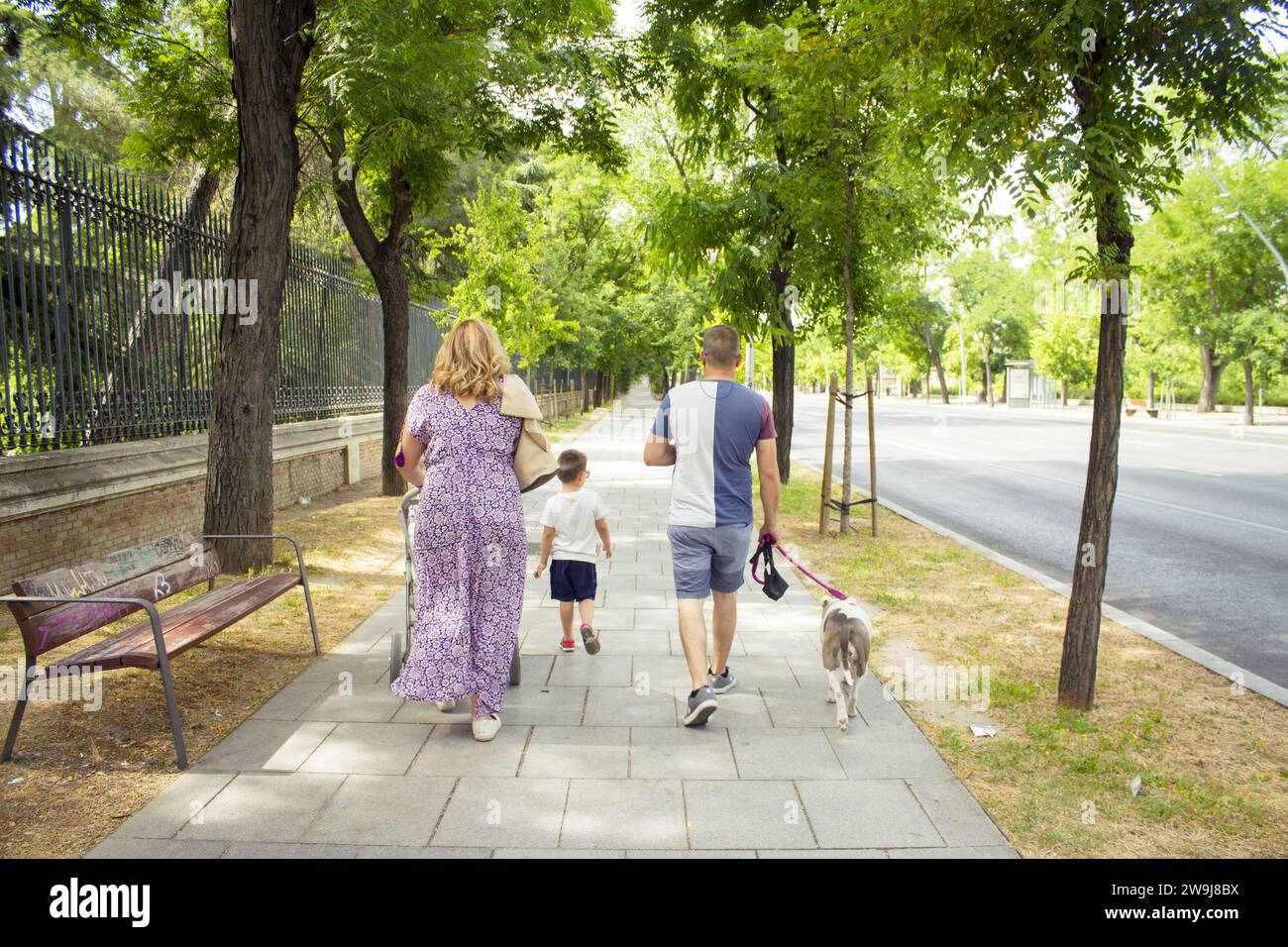 Beautiful girl walking through streets hi-res stock photography and ...