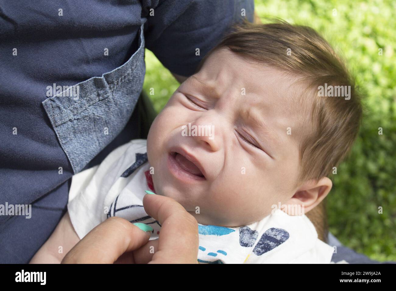 Two month old baby crying. So angry Stock Photo - Alamy