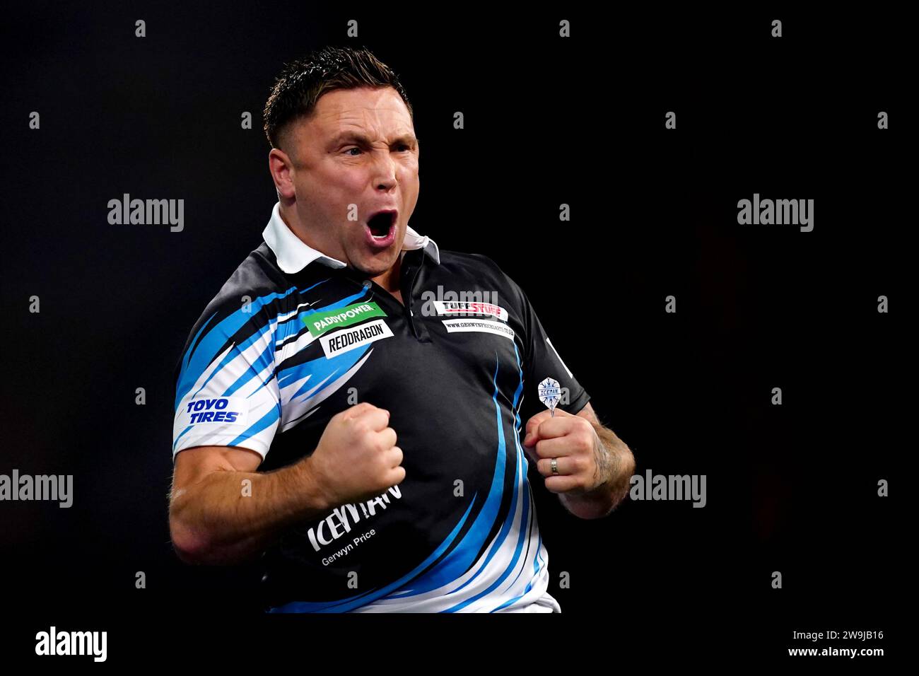 Gerwyn Price reacts during his match against Brendan Dolan on day ...