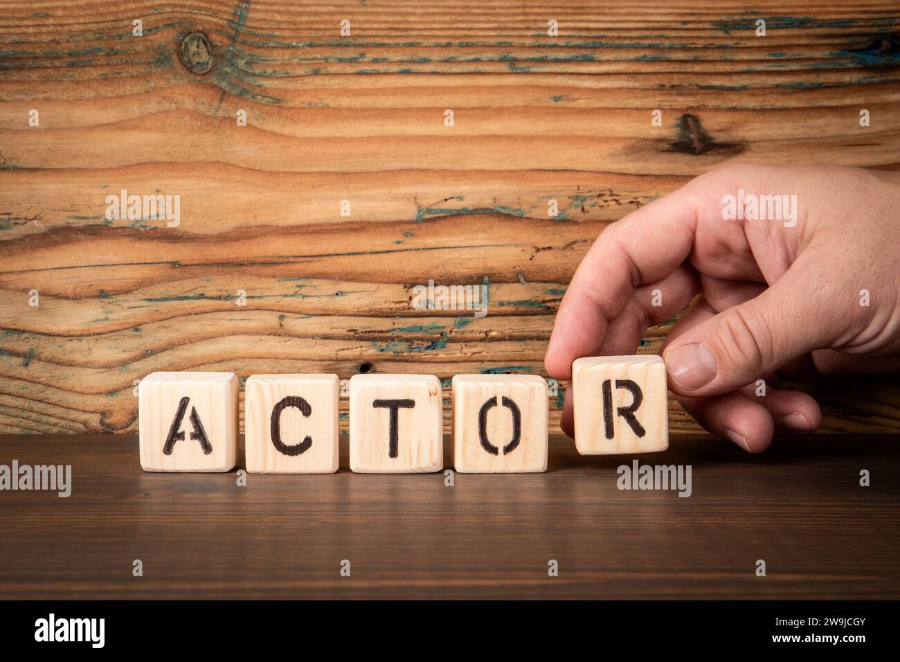 ACTOR. Alphabet blocks on wood texture background Stock Photo - Alamy