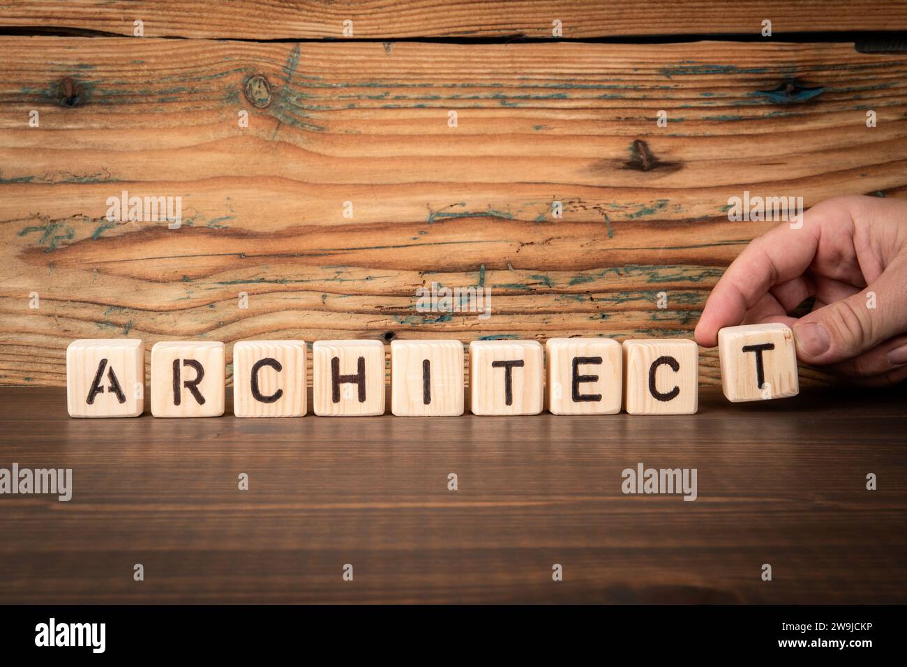 ARCHITECT. Alphabet blocks on wood texture background Stock Photo - Alamy