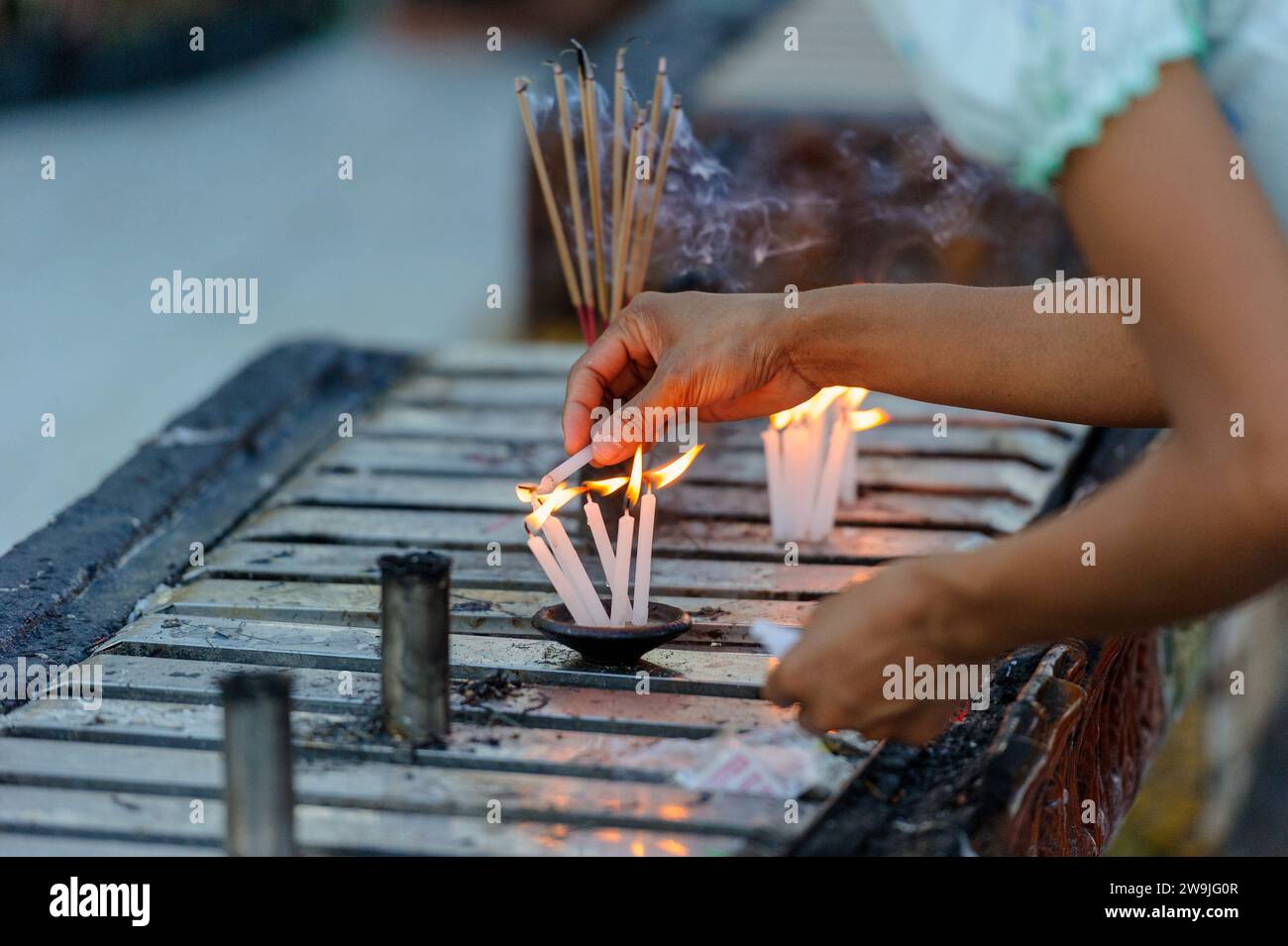 Candle offerings at the Shwedagon Pagoda in Yangon, Myanmar, Burma ...