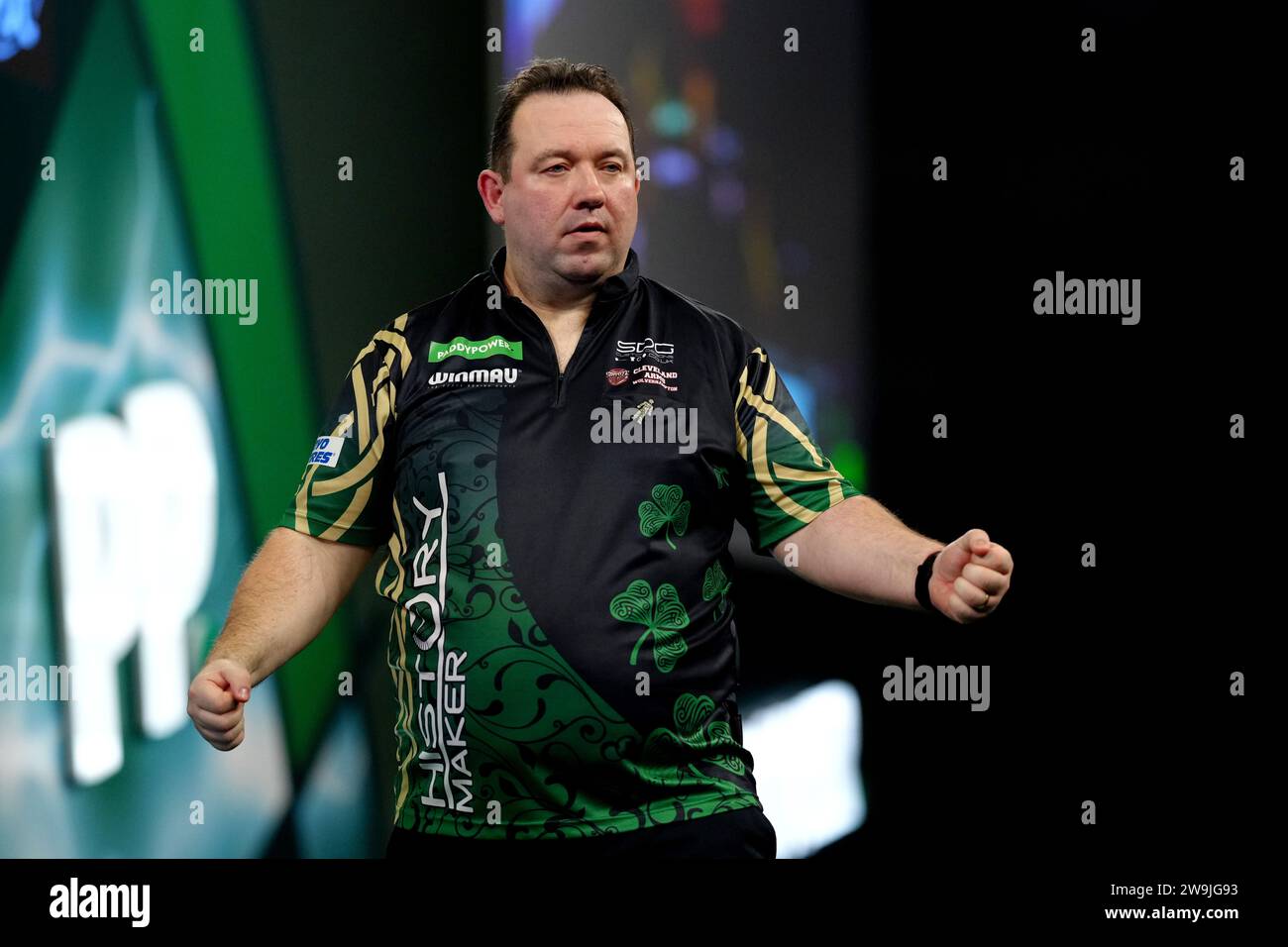 Brendan Dolan celebrates on his way to victory over Gerwyn Price on day ...