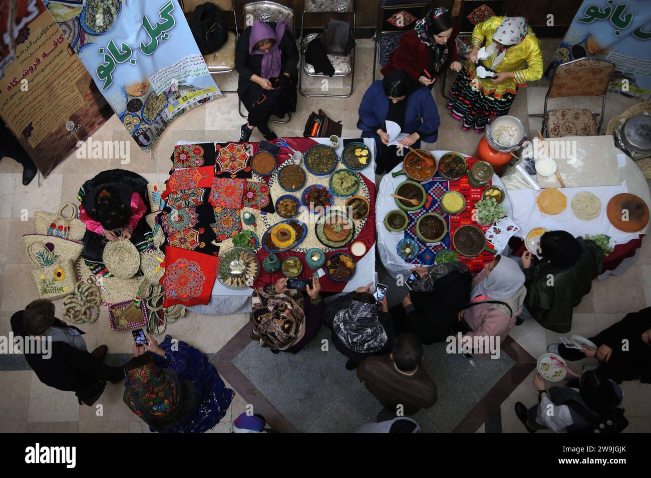 Rasht, Gilan, Iran. 28th Dec, 2023. Iranians visit the food festival in ...