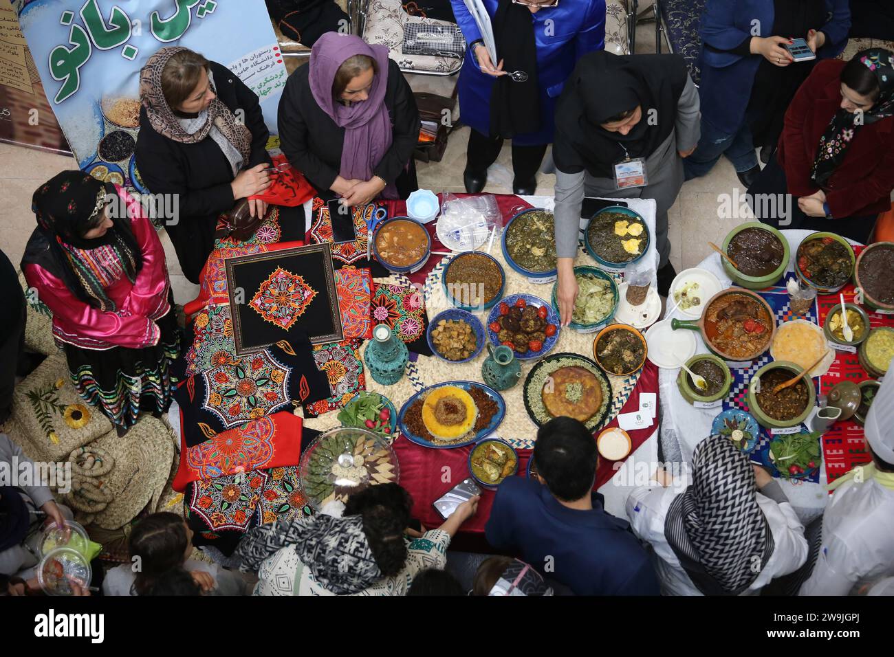 Rasht, Gilan, Iran. 28th Dec, 2023. Iranians visit the food festival in ...