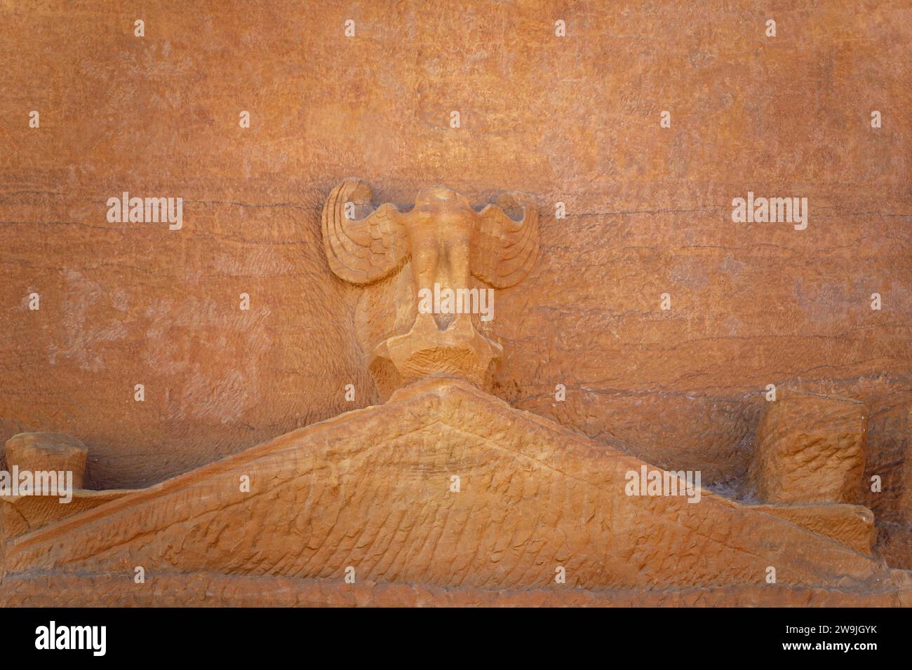 Headless eagle on the facade of Qasr al Farid at Hegra in Saudi Arabia ...