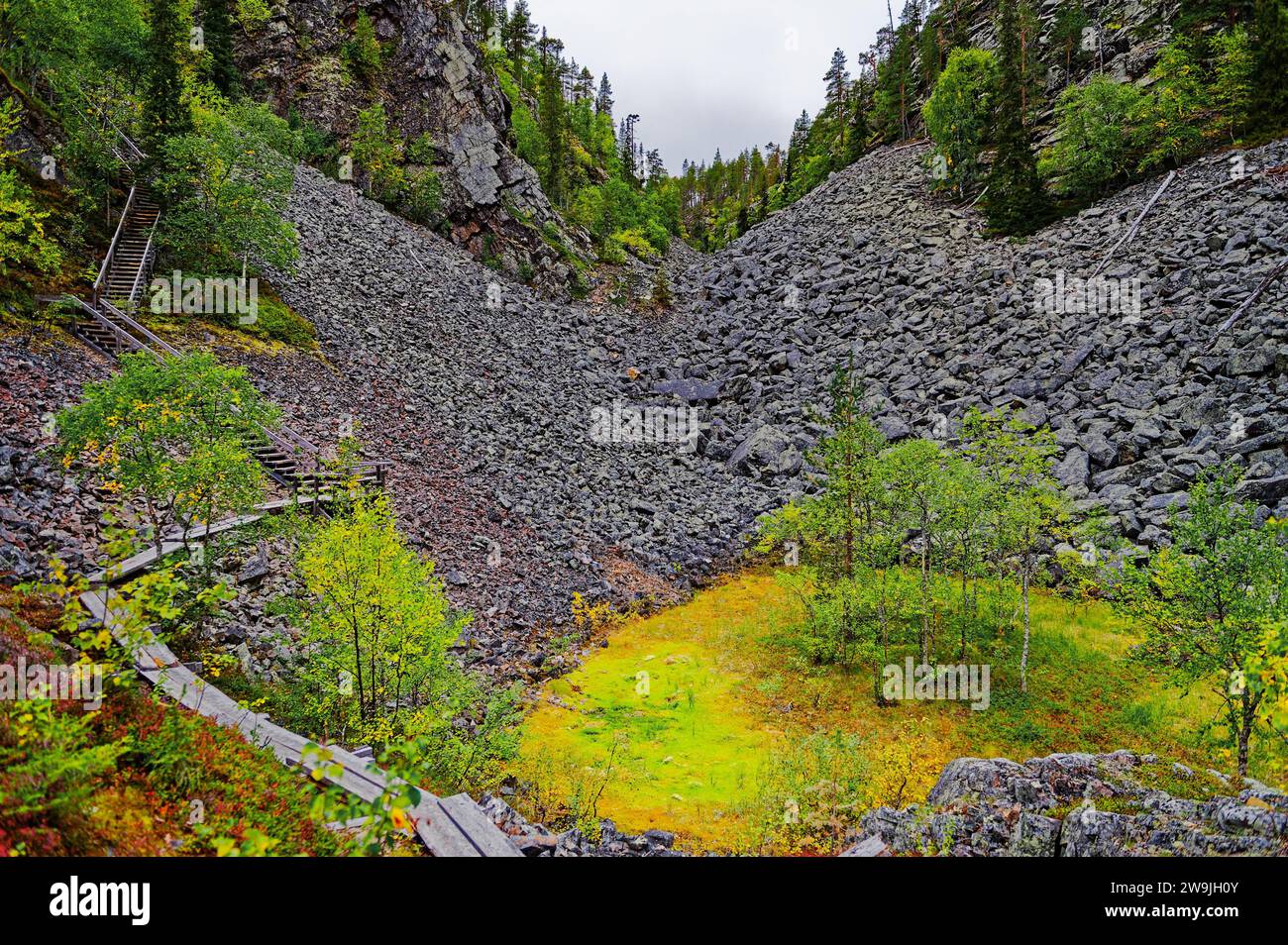 Isokuru gorge with scree-covered slopes, autumn atmosphere, wooden ...