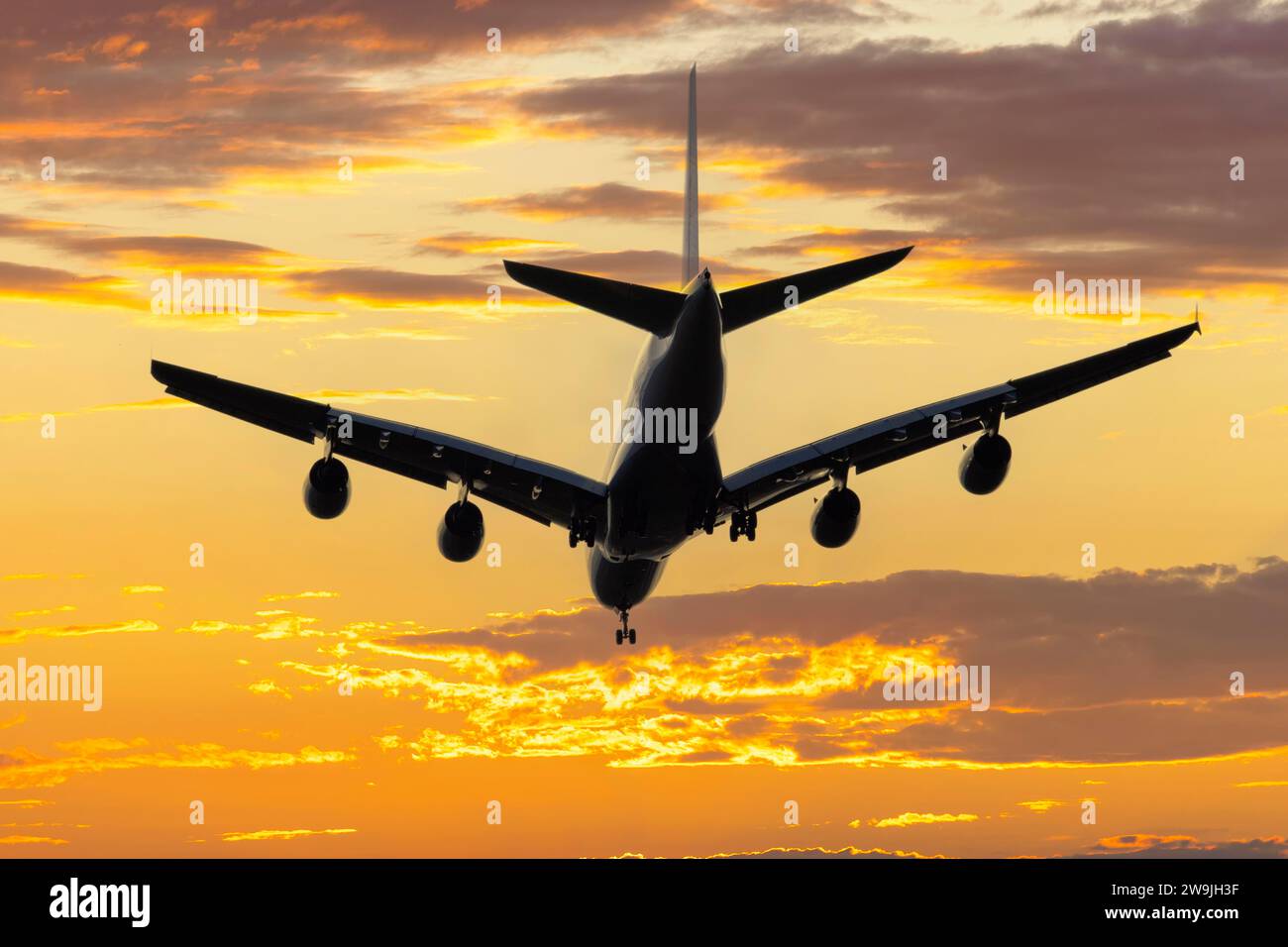 Airbus A380 in front of landing, evening sky, after sunset, Germany ...
