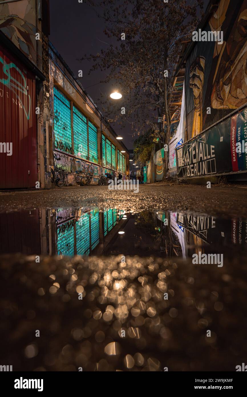 Nocturnal urban path with street art and striking lighting, Berlin ...
