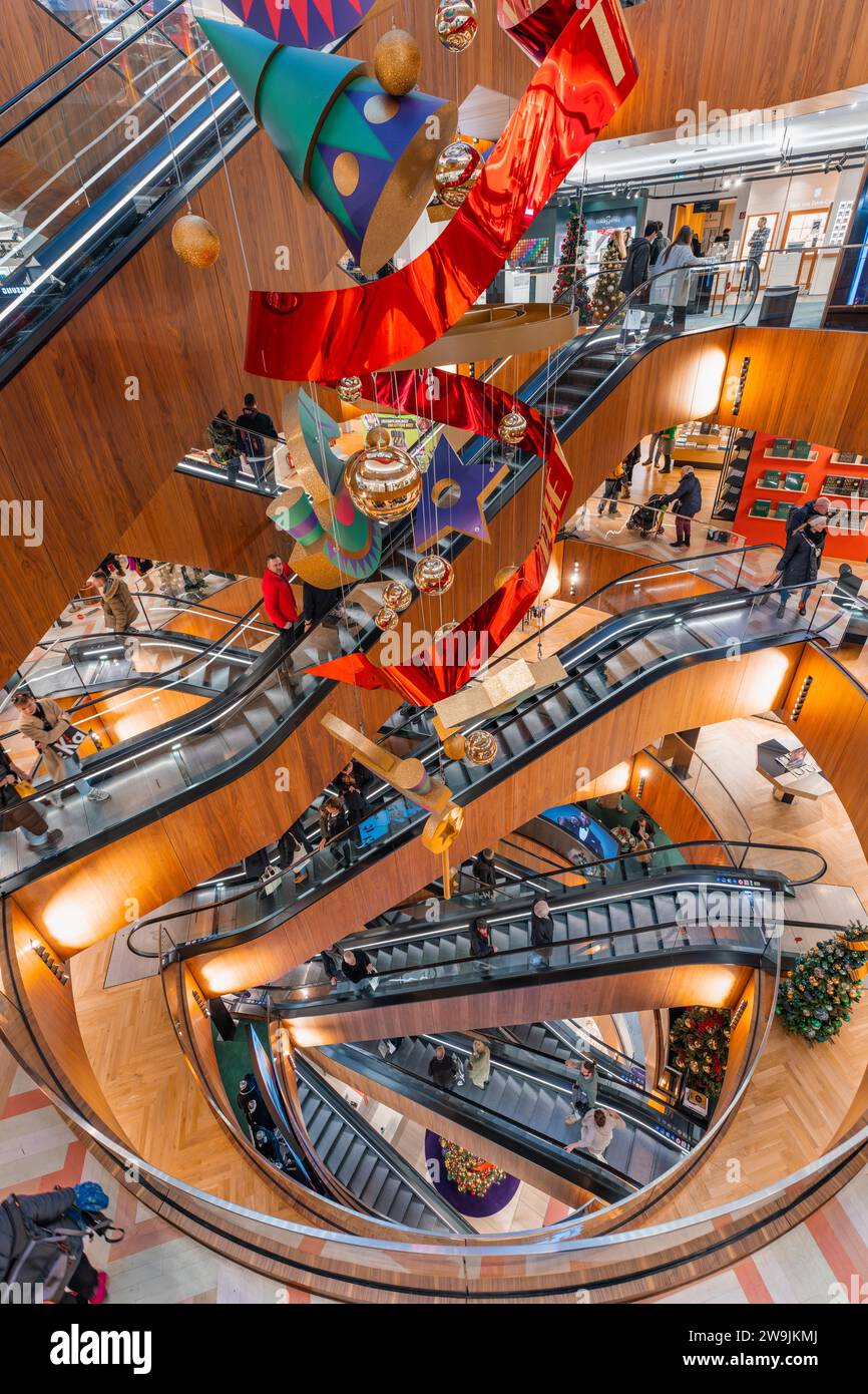Interior view of a modern department stores' with Christmas decorations ...