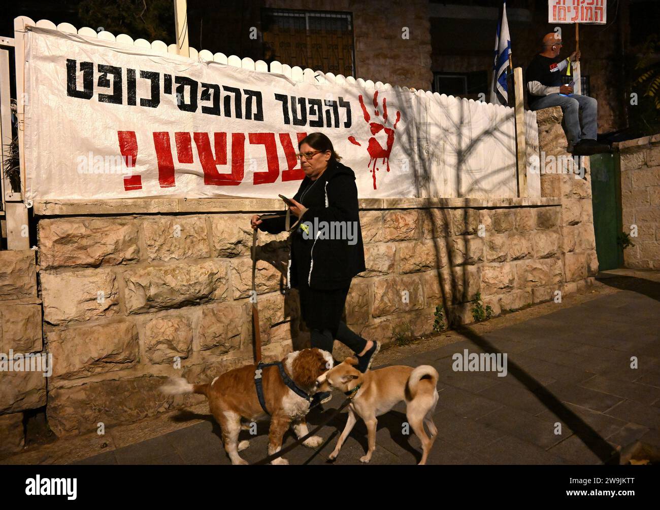 Walks past protesters hi-res stock photography and images - Alamy