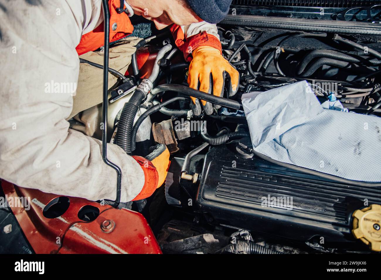 Car engine repair by auto mechanic, car repair Stock Photo - Alamy
