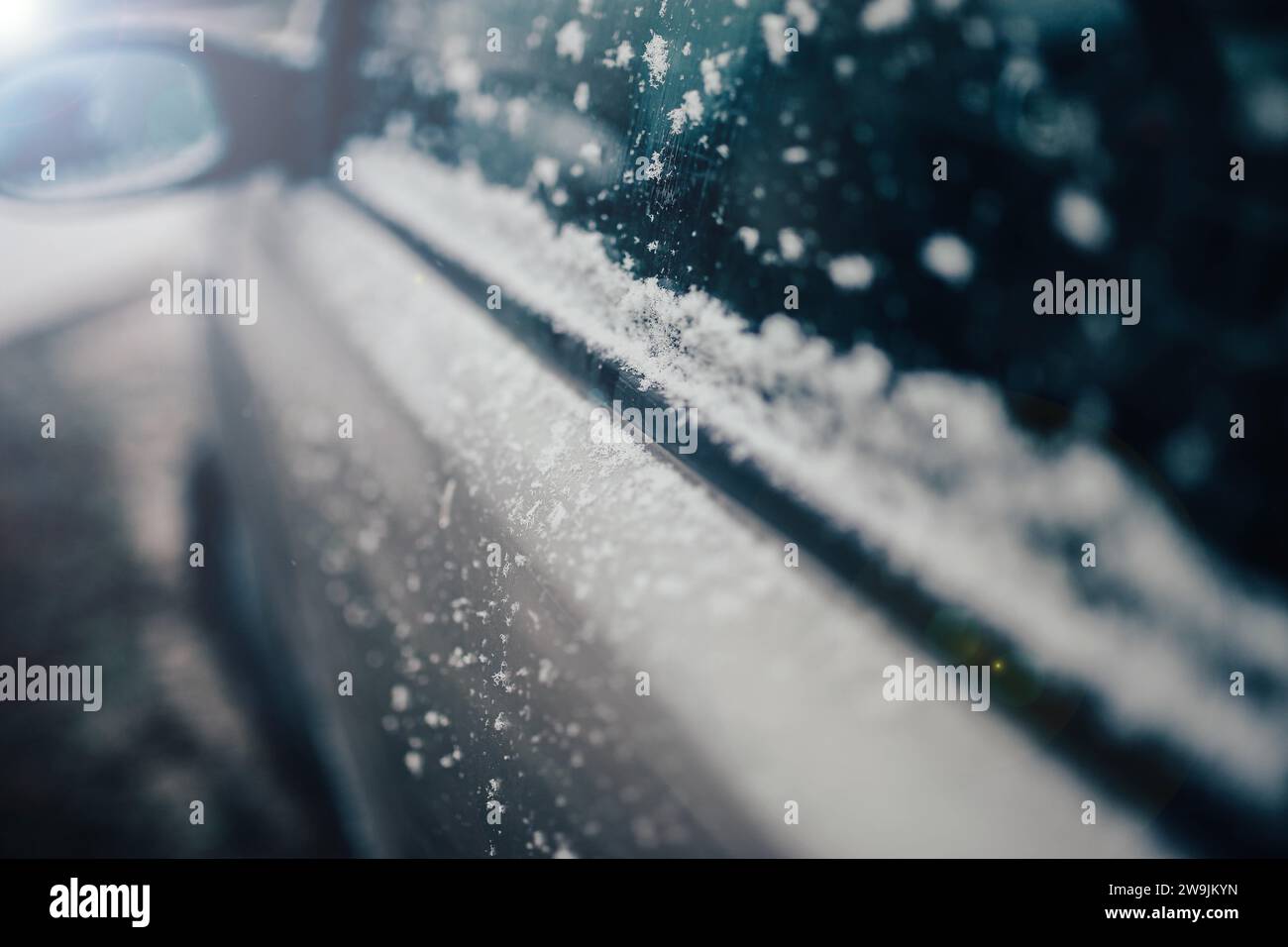 Snow on the car body, winter driving concept, car repair Stock Photo ...