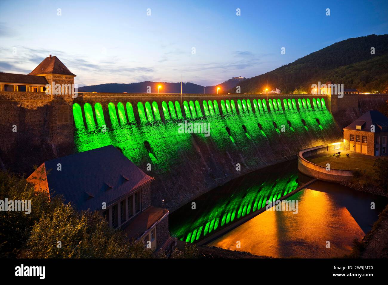 The Edersee dam wall illuminated by LED spotlights holds the German ...