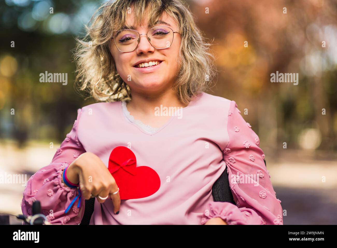 InspireInclusion heart shape, love valentine gesture. Young woman with ...