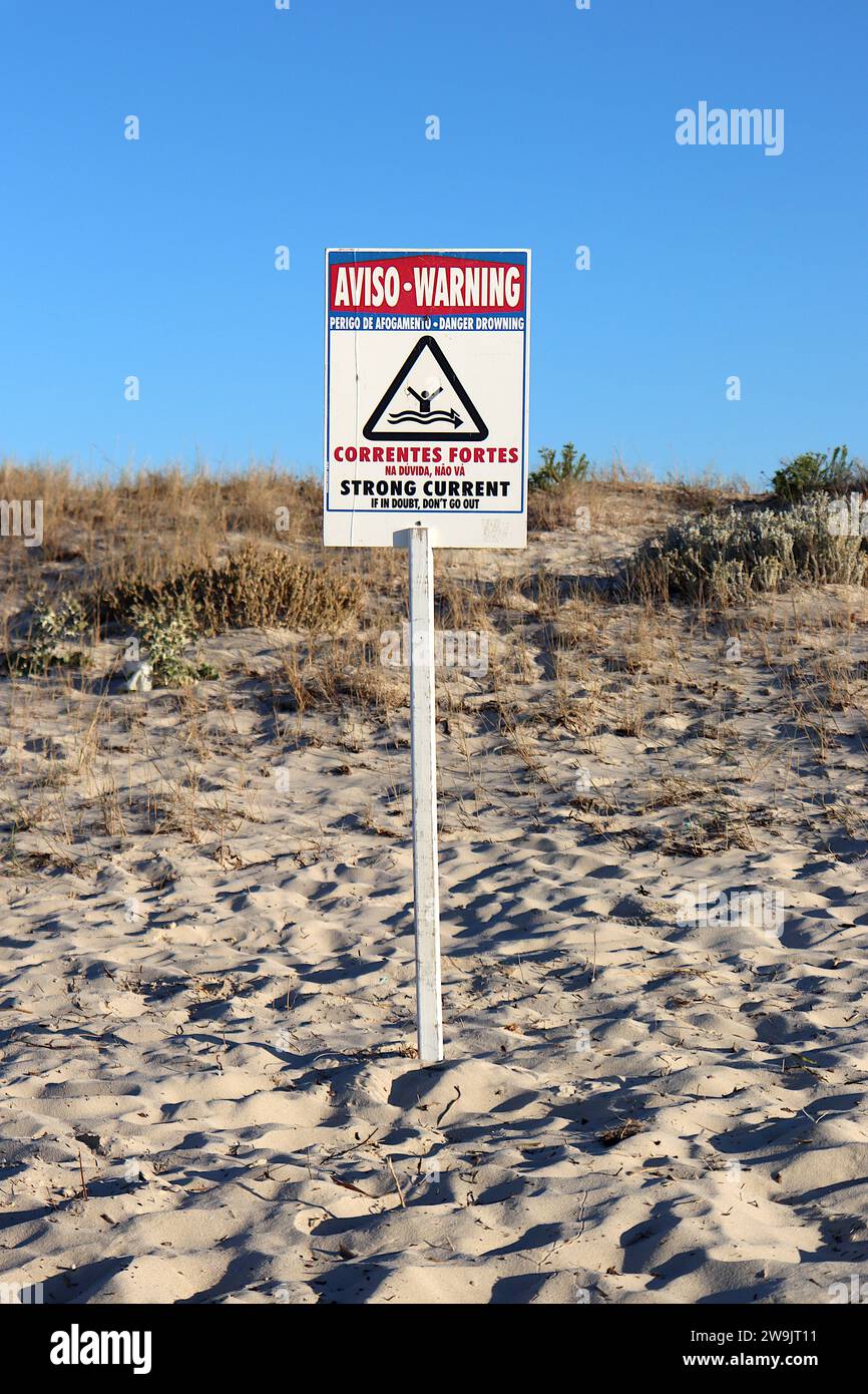 Warning sign at beach: danger of drowning, strong current - if in doubt ...