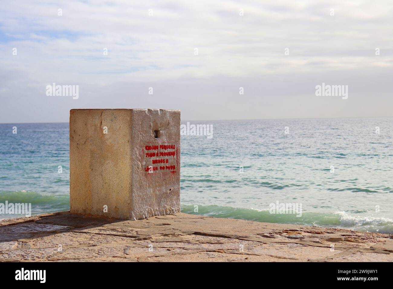 Pillar in front of Praia da Califórnia, Sesimbra, Portugal: "Small town ...
