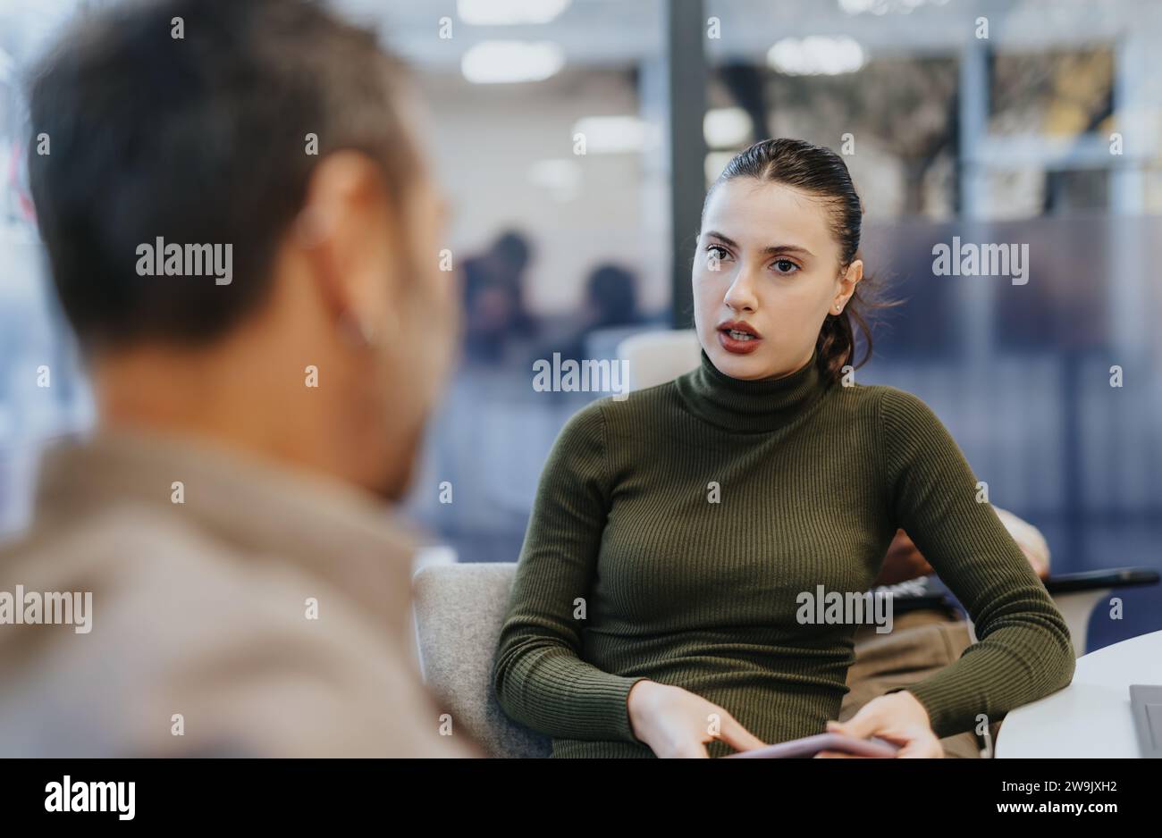 Successful collaboration: Multi-generational colleagues discussing ...