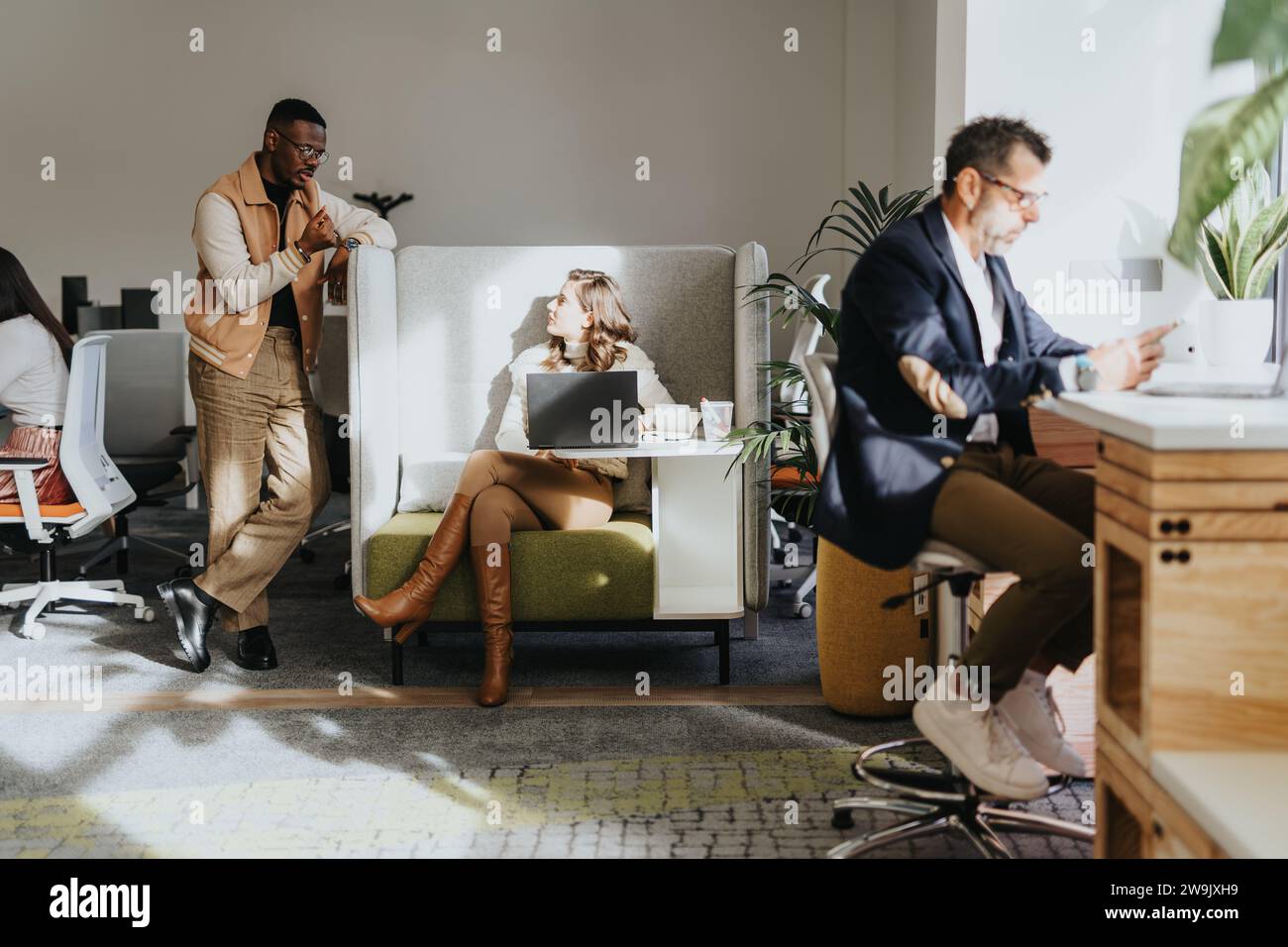 Successful multi-generational business team collaborating and ...