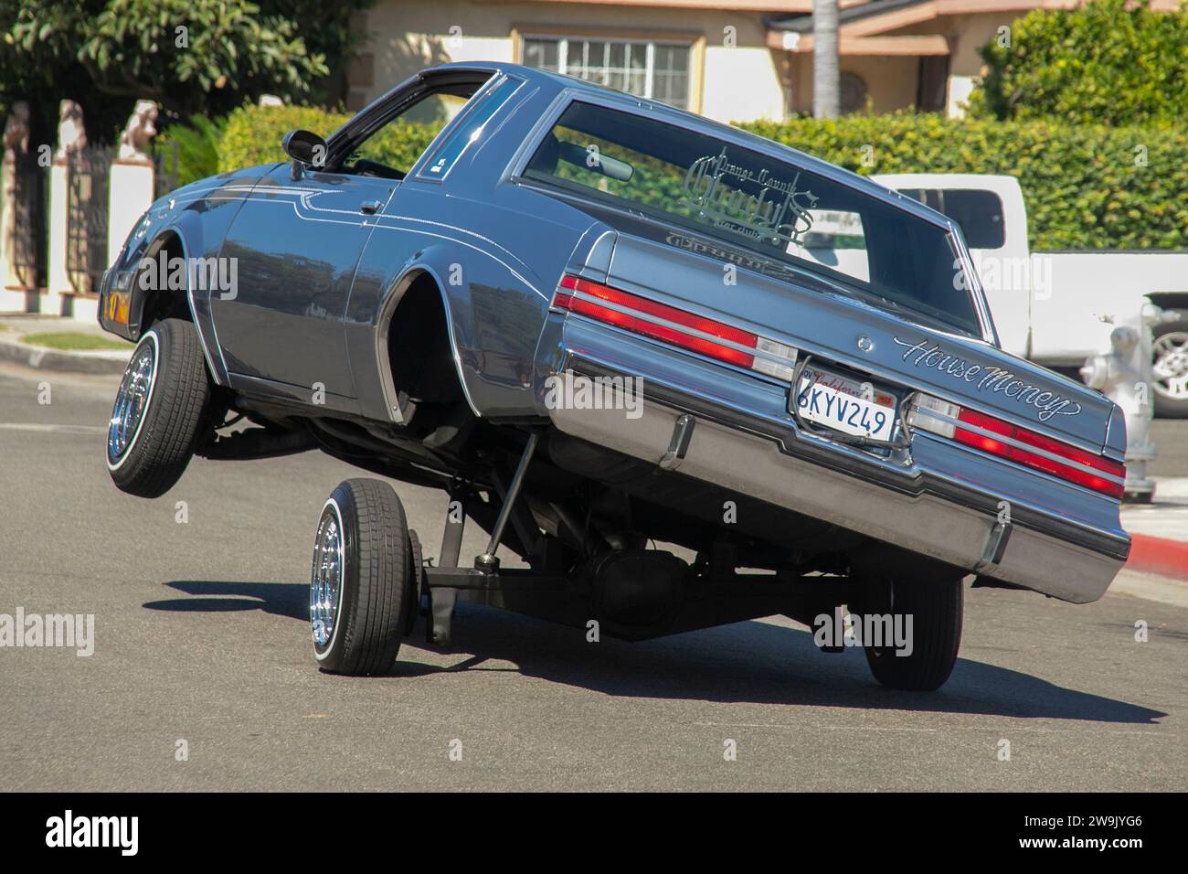 A customized 1982 Buick Regal low-rider car does a tilting ...