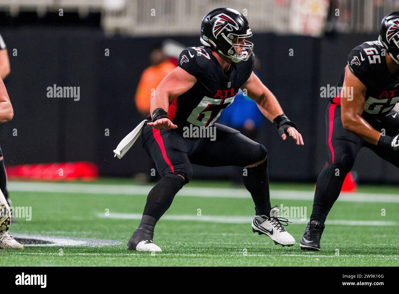 Atlanta Falcons center Drew Dalman (67) works during the first half of ...
