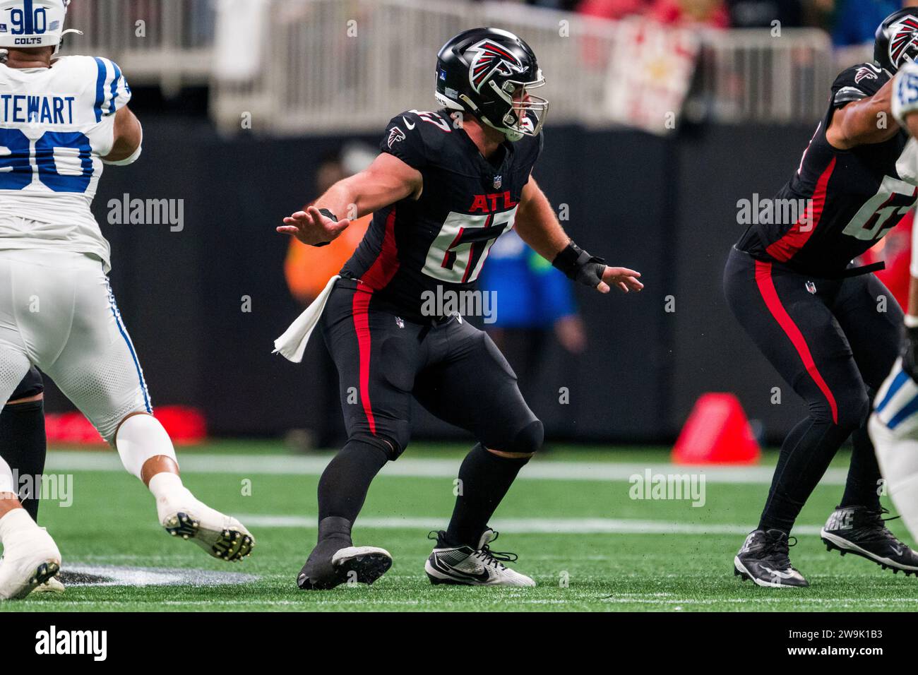 Atlanta Falcons center Drew Dalman (67) works during the first half of ...